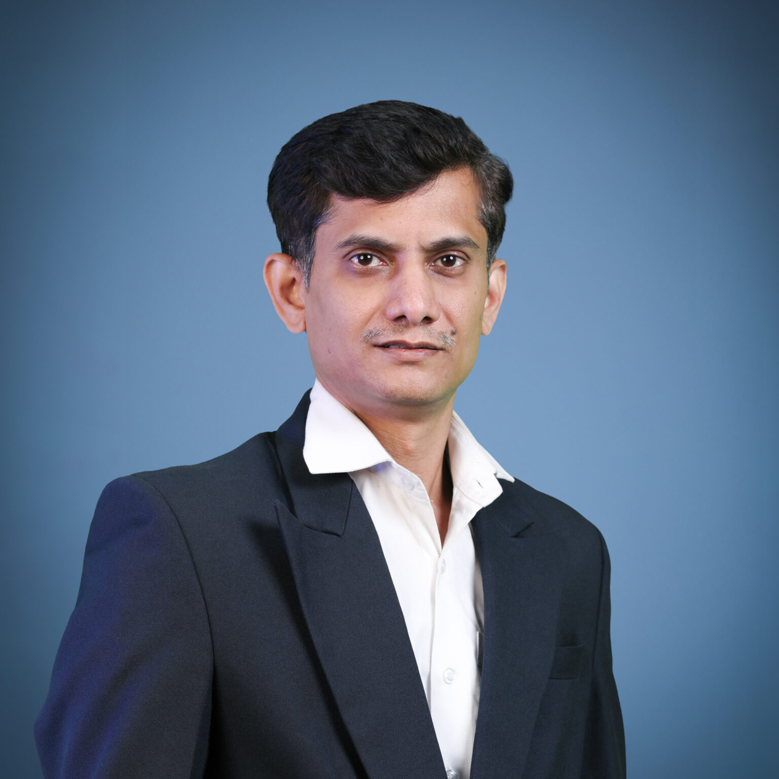 Dr. CHETAN R